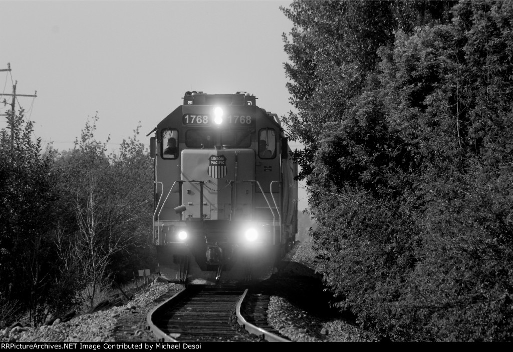 UP SD40N #1768 leads the northbound Cache Valley Local (LCG-41C) just coming off the UIC bridge ...
